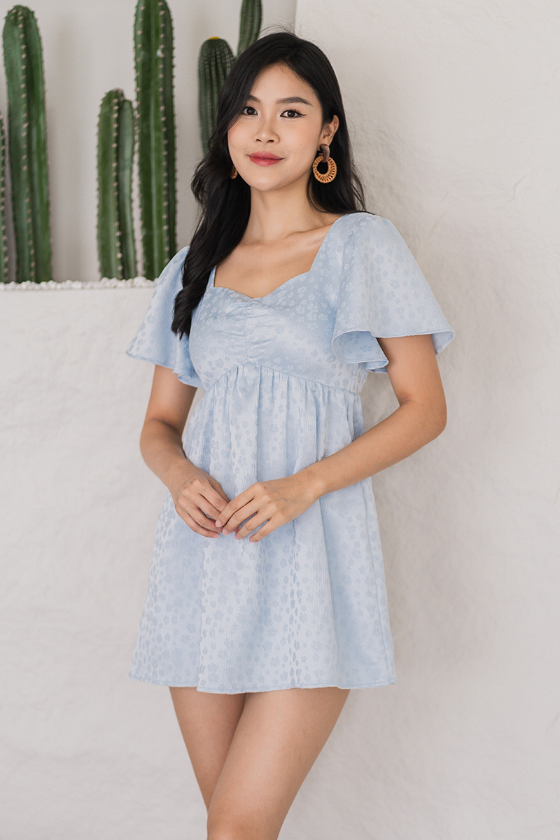 Angela Flutter Sleeve Babydoll Romper Dress (Powder Blue Poppy) | Dear Lyla