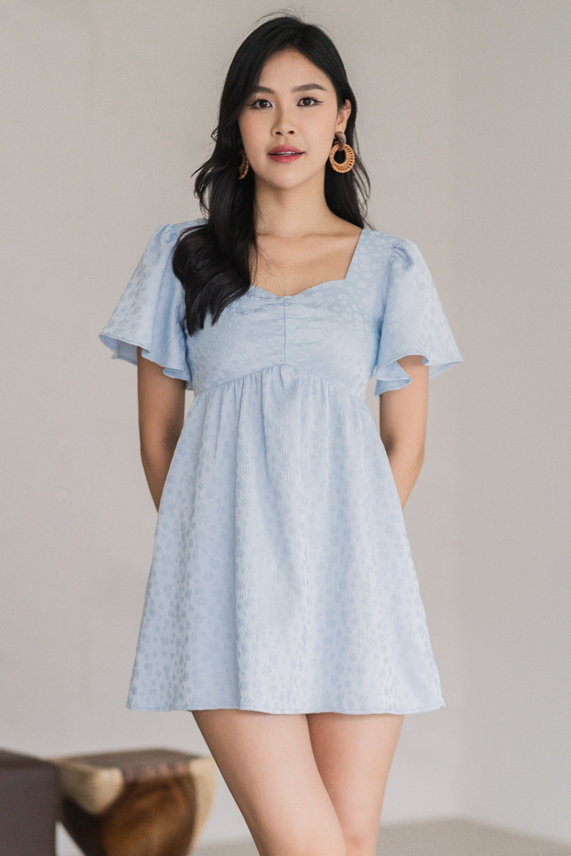 Angela Flutter Sleeve Babydoll Romper Dress (Powder Blue Poppy) | Dear Lyla